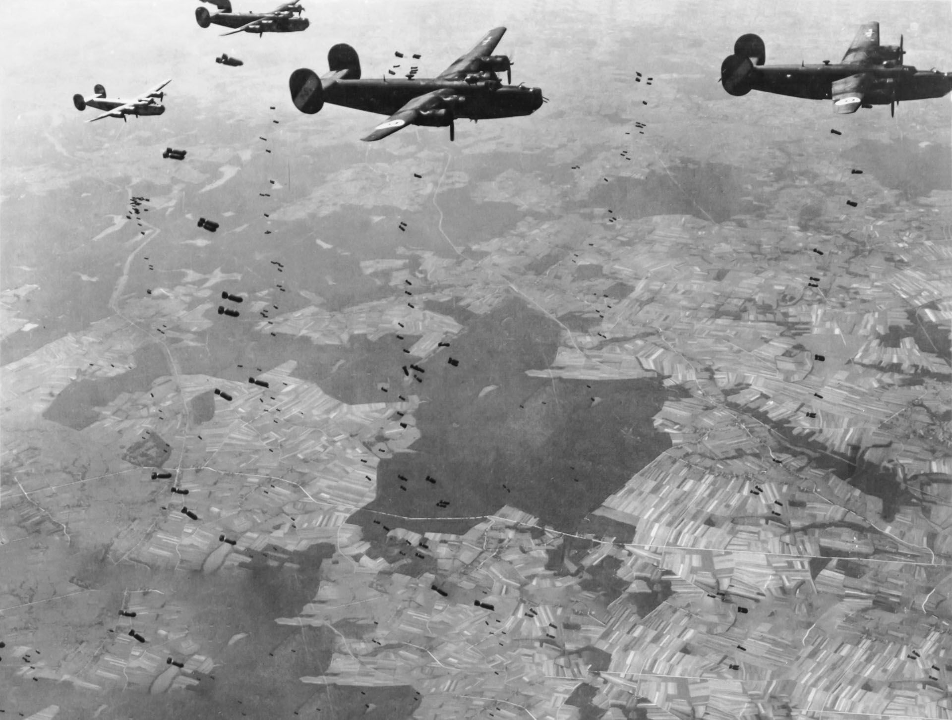 Consolidated B-24 Liberators Drop Bombs on Target - Wings Tracks Guns